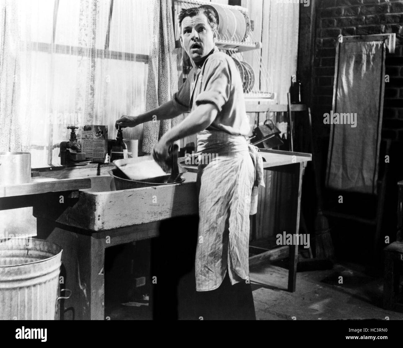RAISING A RIOT, Kenneth More, 1955 Stock Photo - Alamy