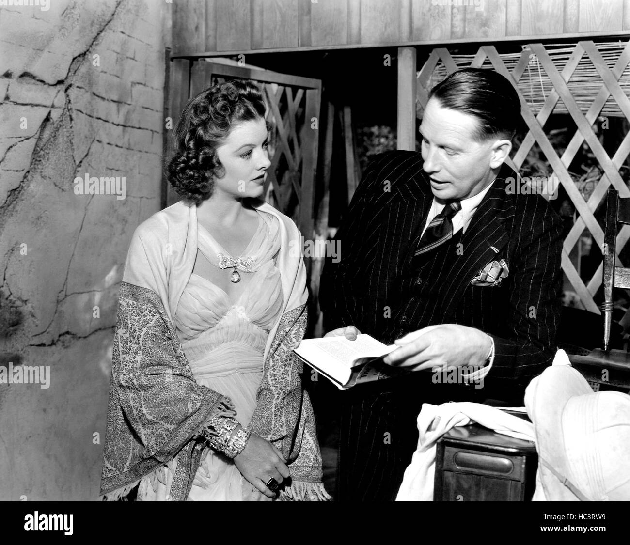 THE RAINS CAME, from left, Myrna Loy, source author Louis Bromfield, on ...
