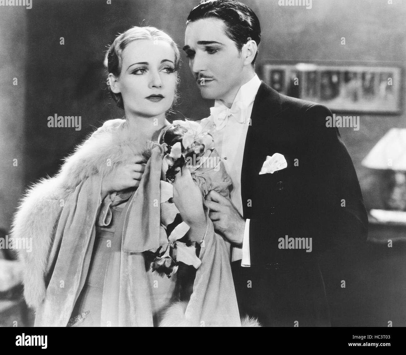 THE RACKETEER, from left: Carole Lombard, Roland Drew, 1929 Stock Photo ...