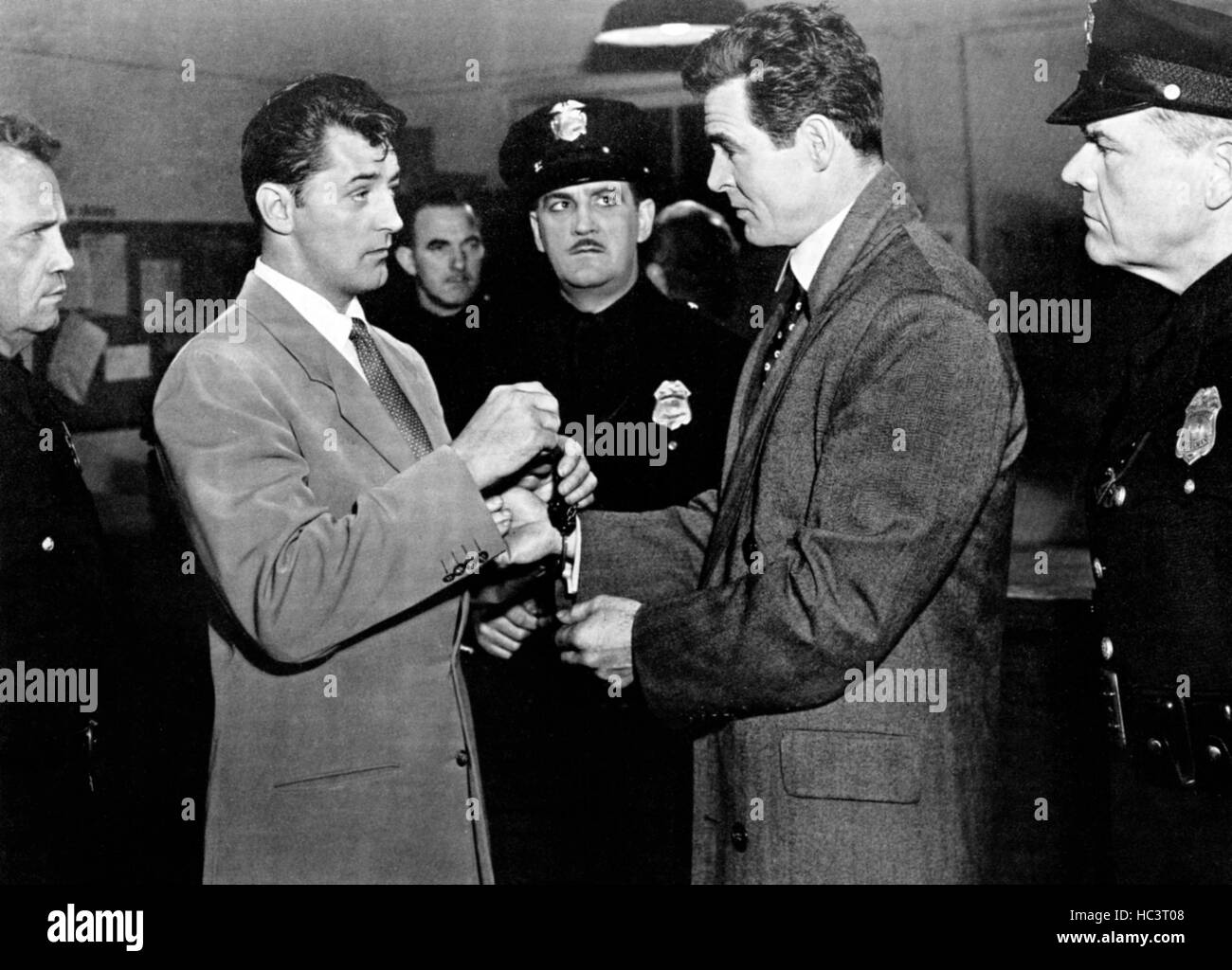 THE RACKET, front from left; Walter Sande, Robert Mitchum, Robert Ryan ...