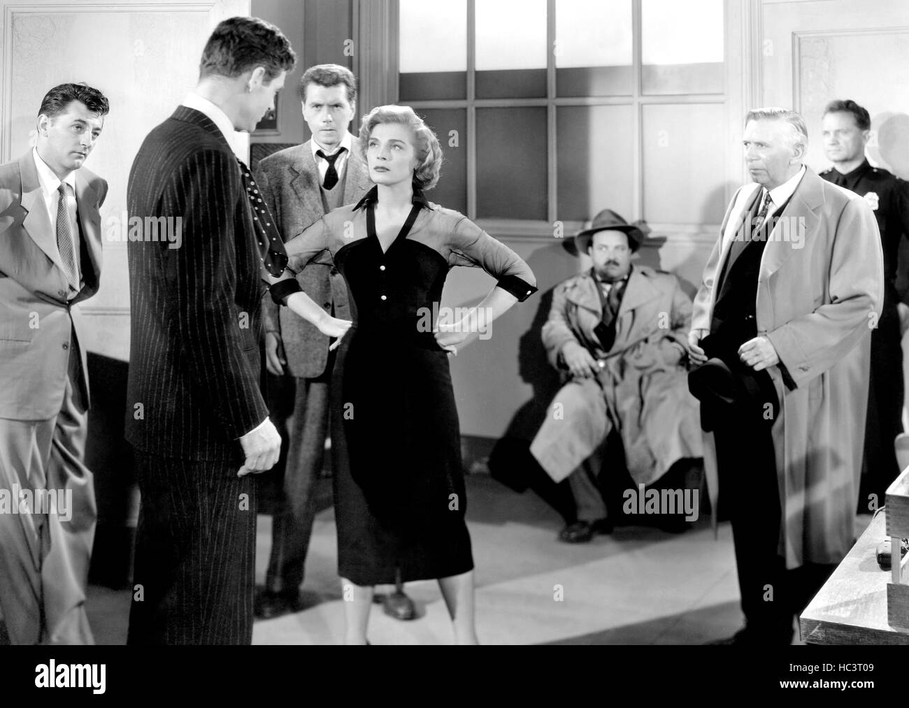 THE RACKET, from left, Robert Mitchum, Robert Ryan, Robert Hutton ...