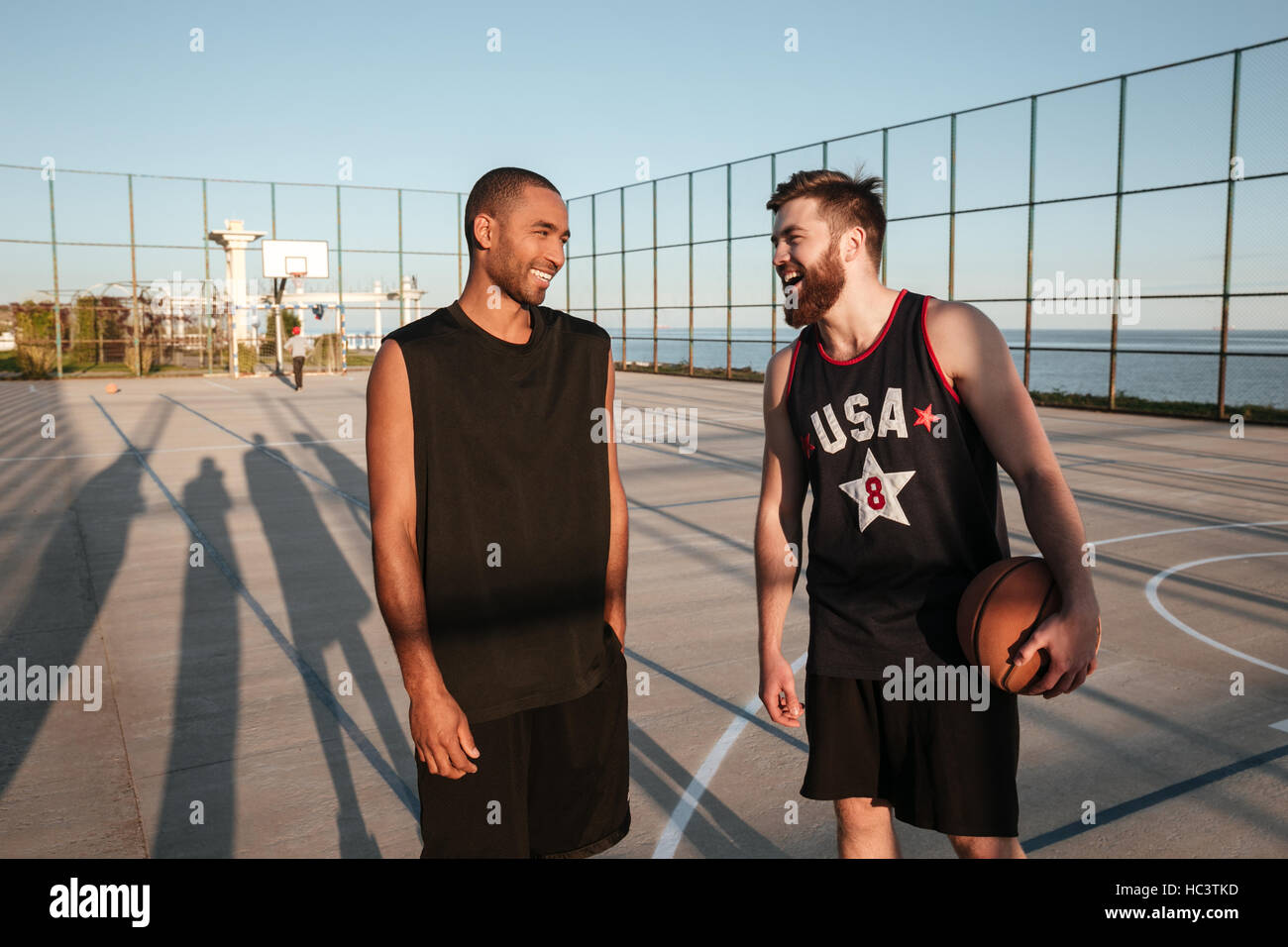 Smiling sportsmen hi-res stock photography and images - Alamy