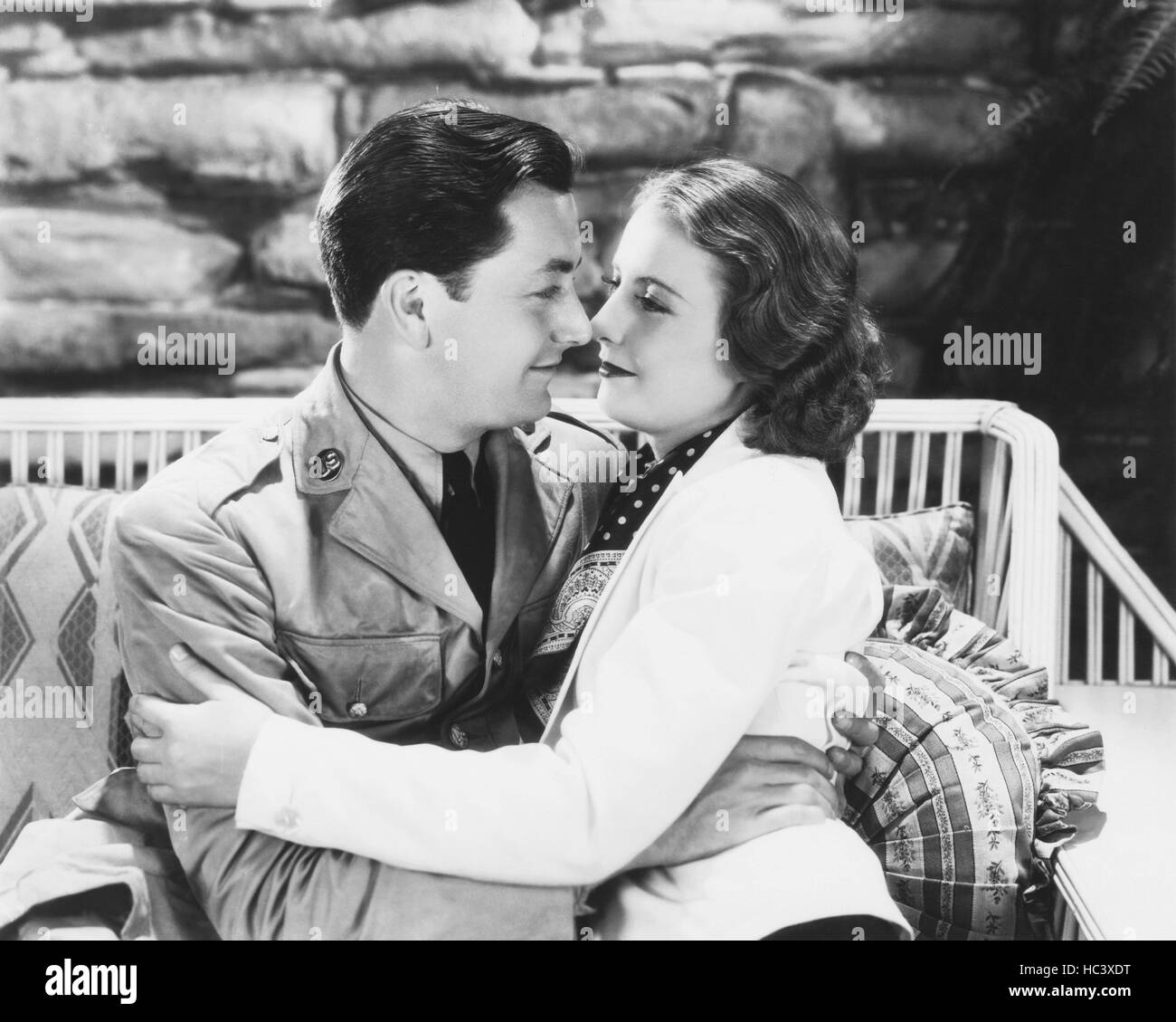RED SALUTE, from left: Robert Young, Barbara Stanwyck, 1935 Stock Photo - Alamy