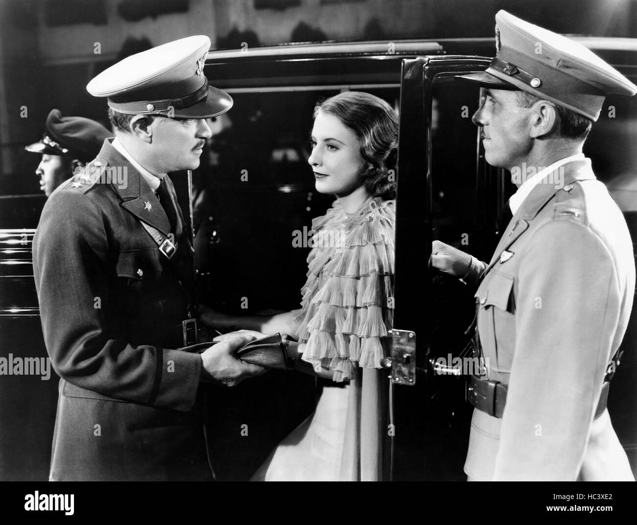 RED SALUTE, Purnell Pratt (left), Barbara Stanwyck (center), 1935 Stock Photo - Alamy