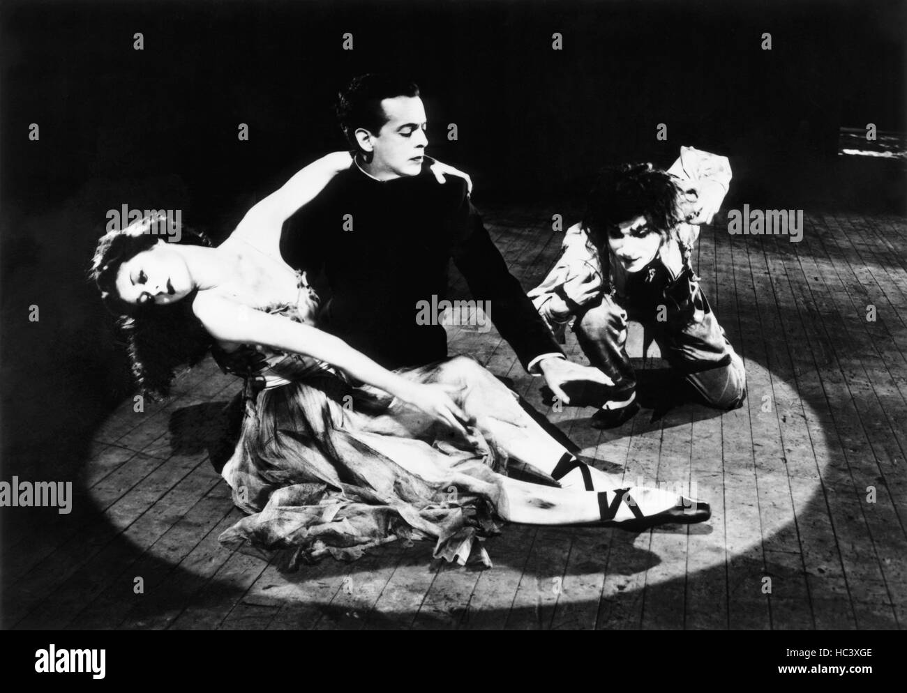 THE RED SHOES, from left: Moira Shearer, Robert Helpmann, Leonide ...