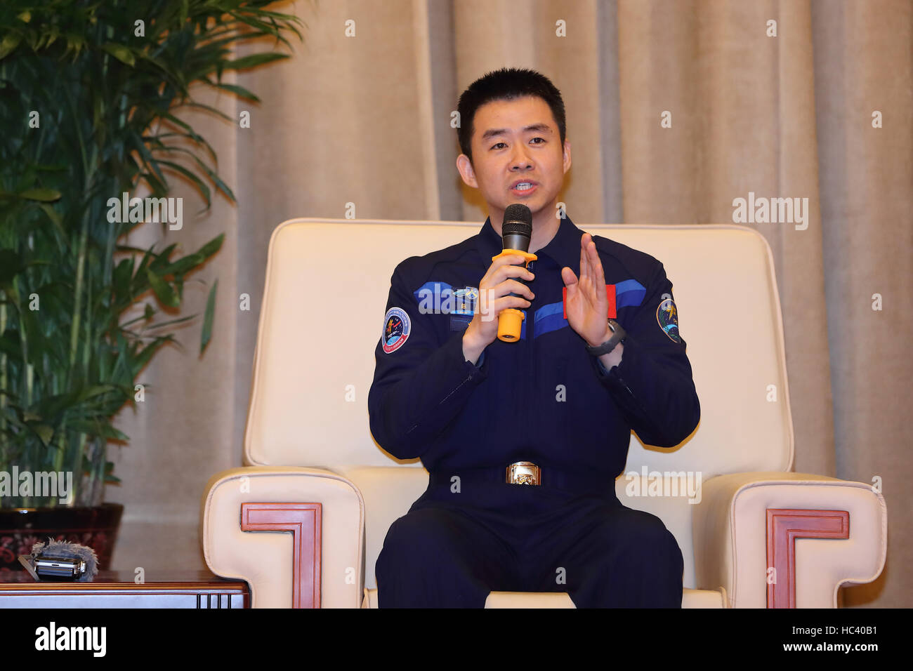 Beijing, China. 7th Dec, 2016. Chinese astronaut Chen Dong answers ...