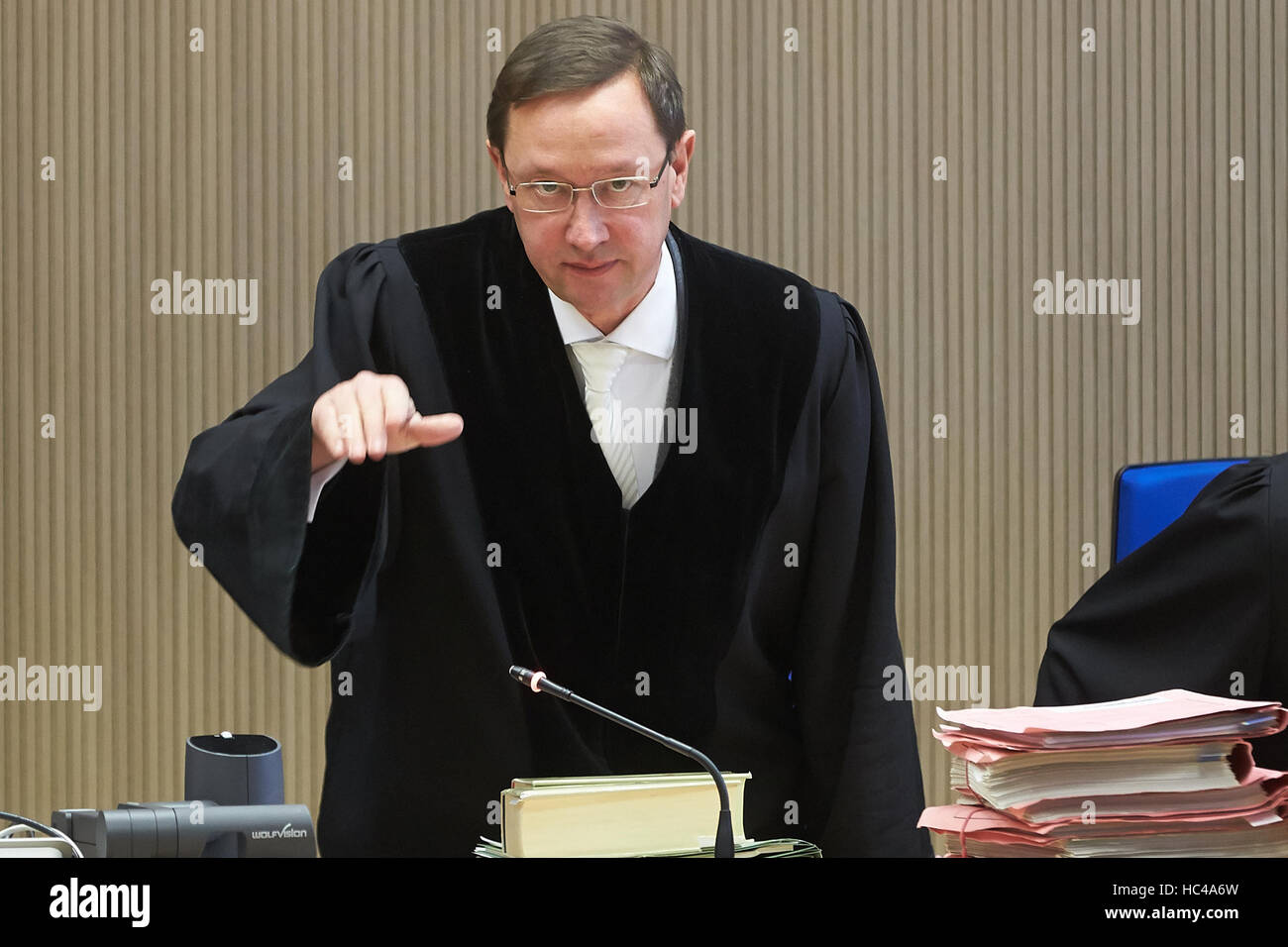 Presiding judge Thomas Metzger opens the hearing in the case of ...