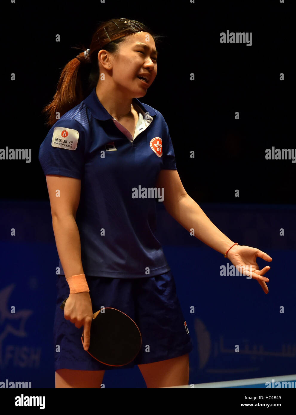 Doha, Qatar. 8th Dec, 2016. Lee Ho Ching from Hong Kong of China reacts ...