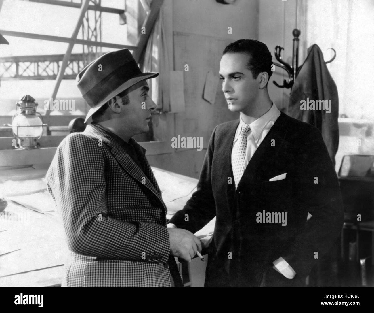 ORAGE, Charles Boyer, director Marc Allegret on set, 1938 Stock Photo ...