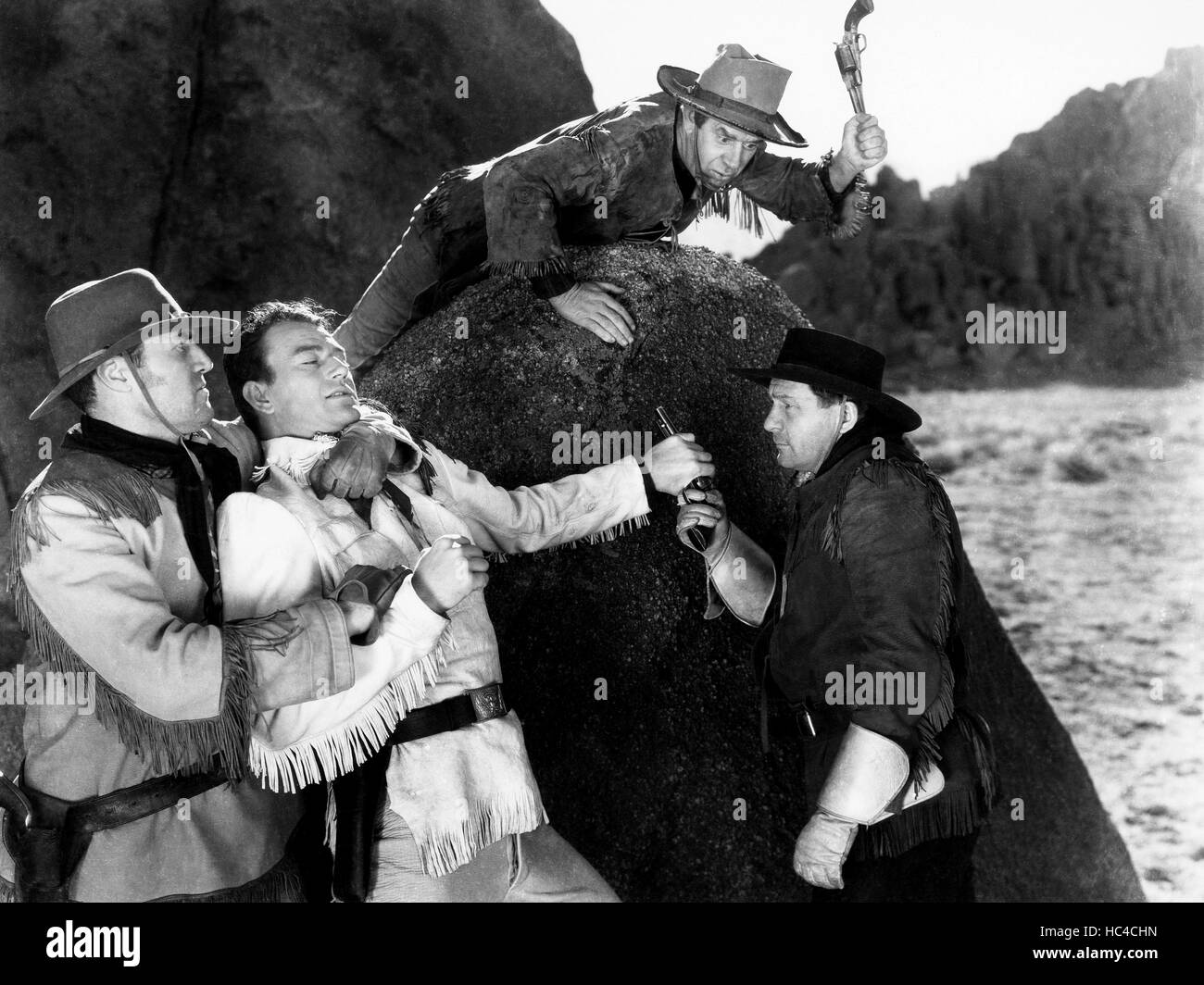 THE OREGON TRAIL, from left, Frank Rice, John Wayne, Harry Harvey, 1936 ...