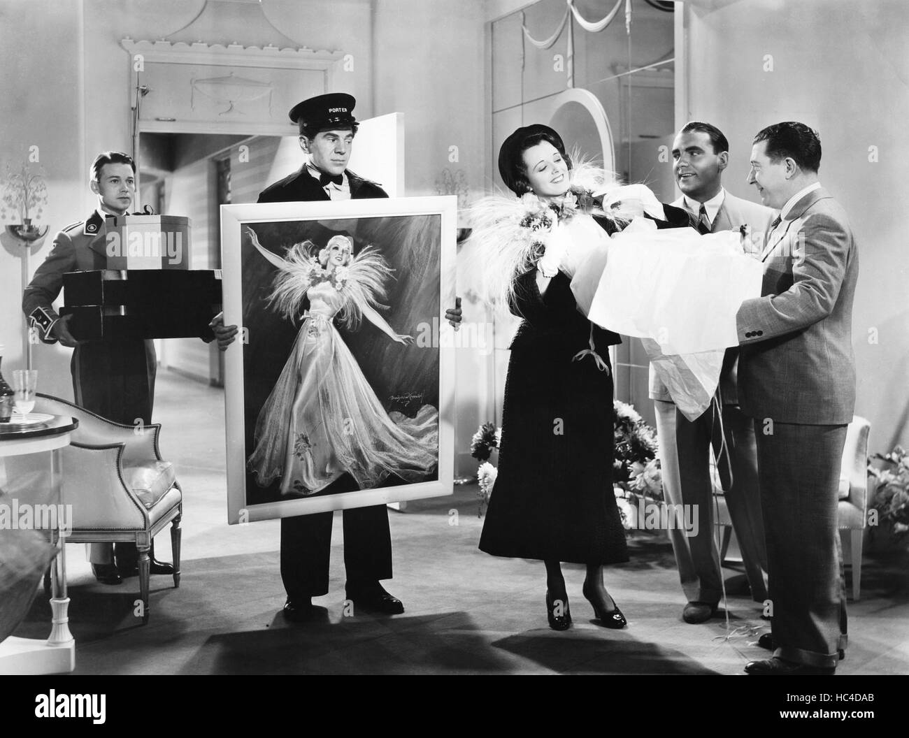 PAGE MISS GLORY, from left: Marion Davies (in painting), Lionel Stander ...