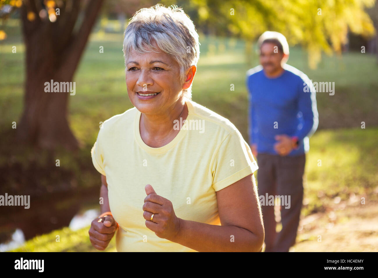 Elderly woman running hi-res stock photography and images - Alamy