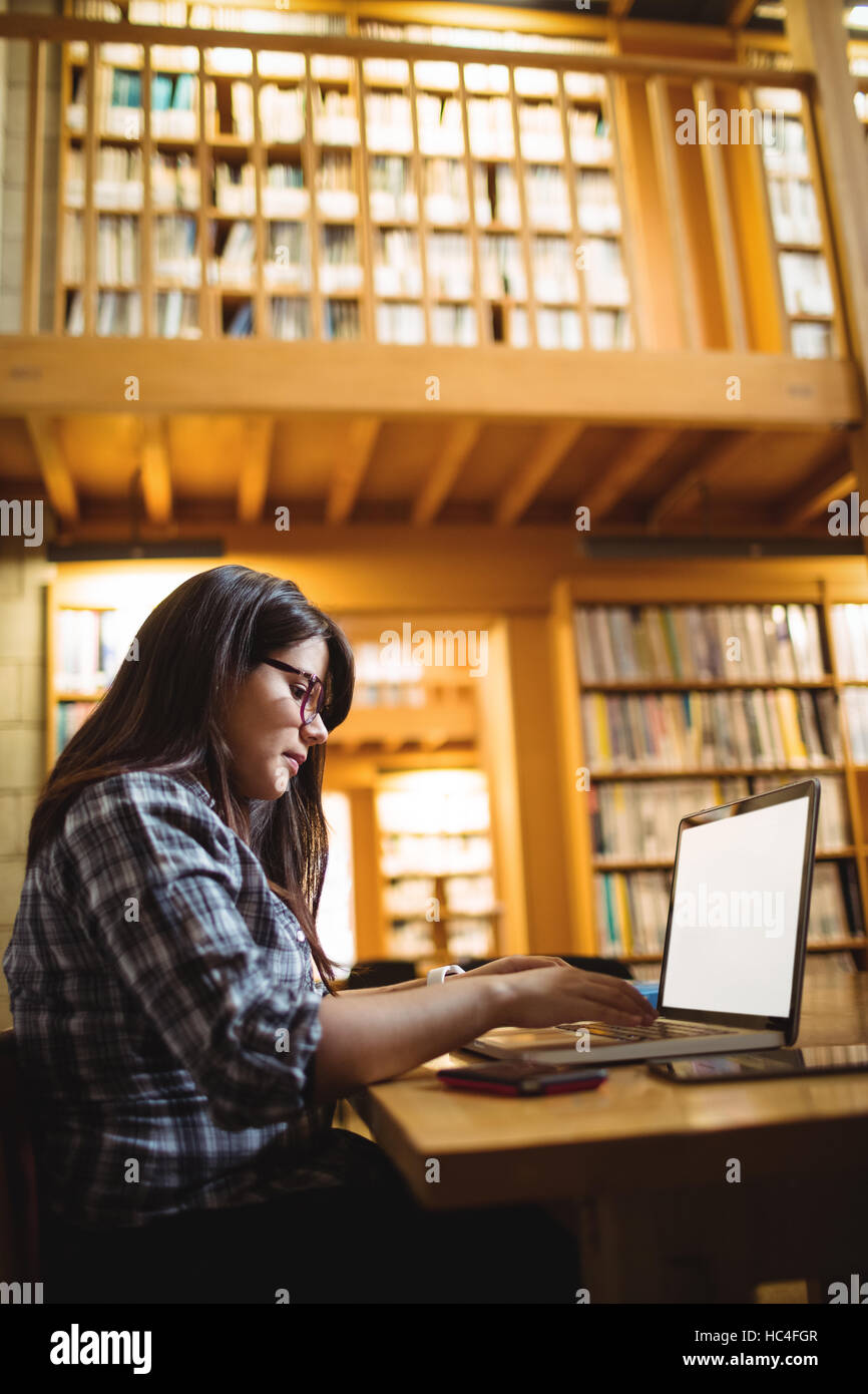 Female student studying library hi-res stock photography and images - Alamy