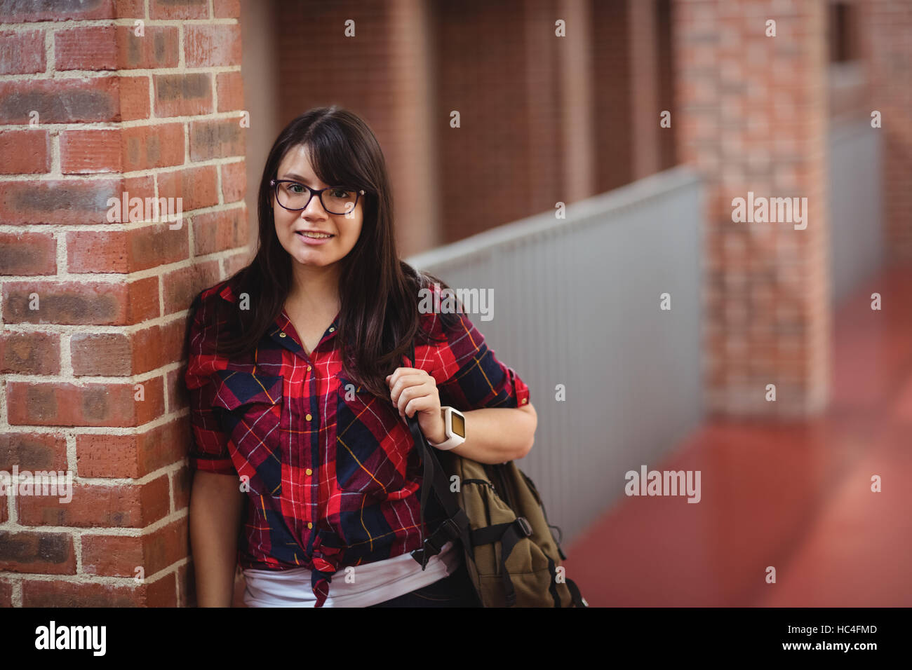 Female student standing hi-res stock photography and images - Alamy