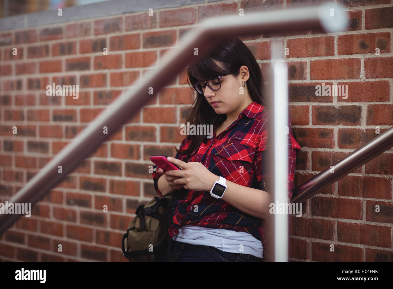 Female student using mobile phone Stock Photo - Alamy