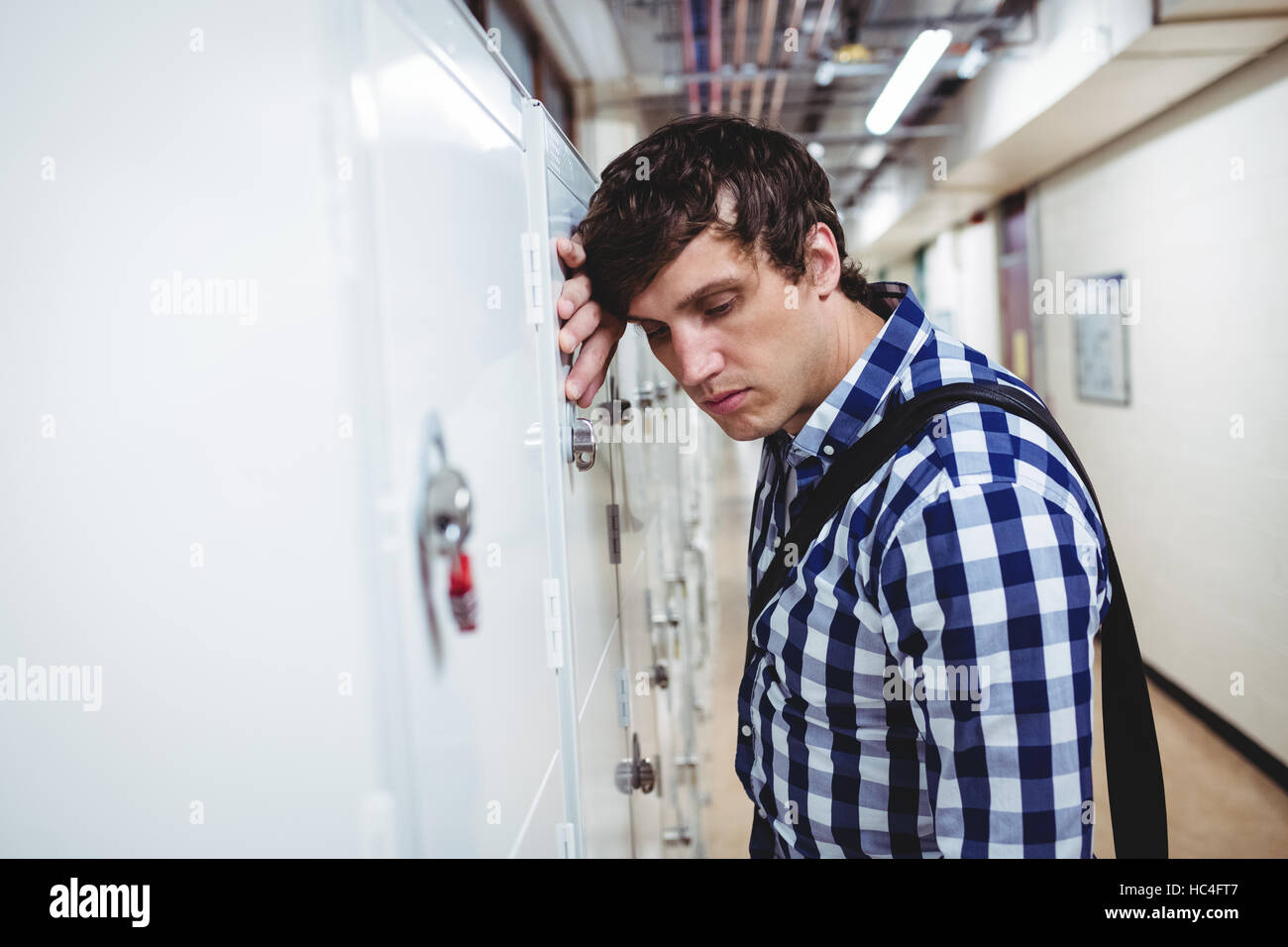 Sad male student hi-res stock photography and images - Alamy