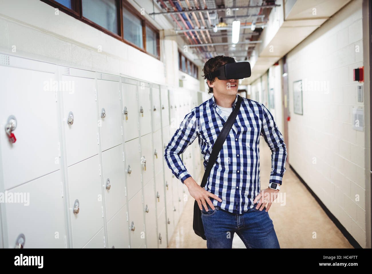 Student using virtual reality headset in locker room Stock Photo - Alamy