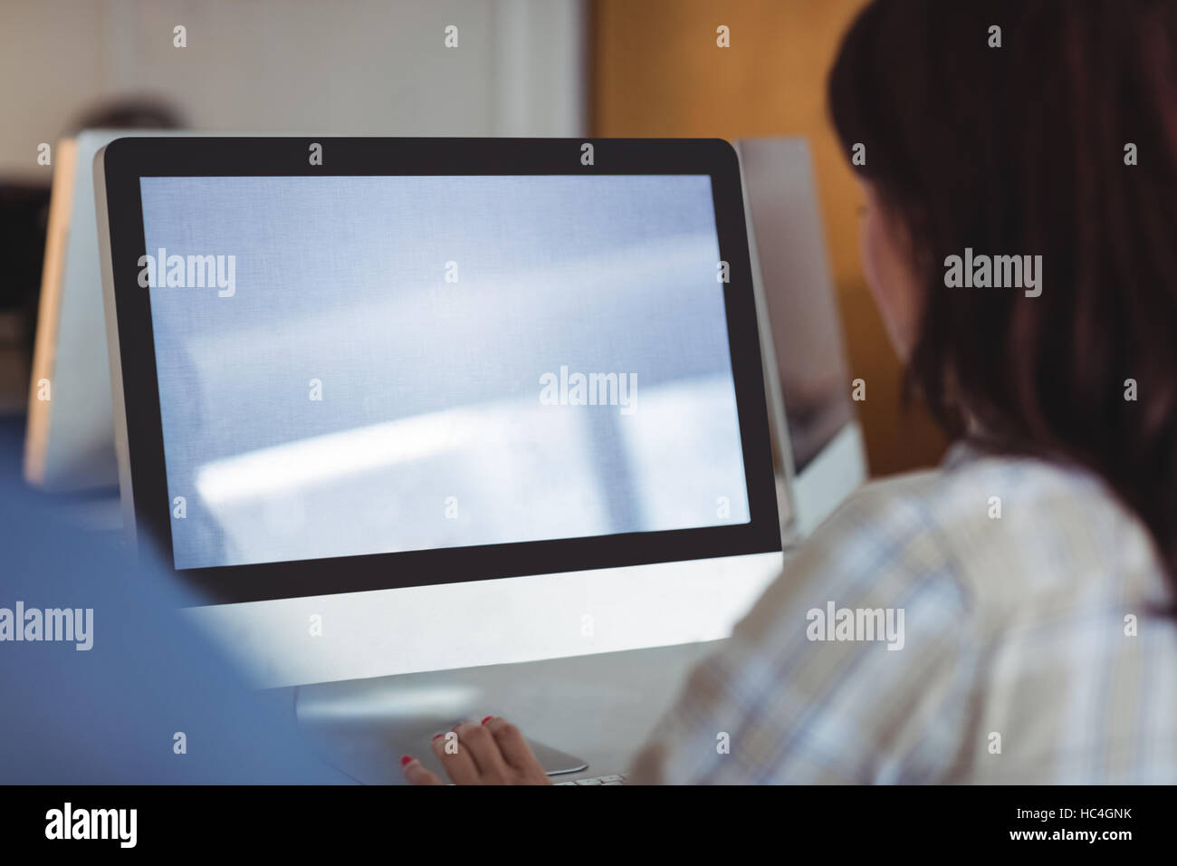 Mature student using computer Stock Photo - Alamy