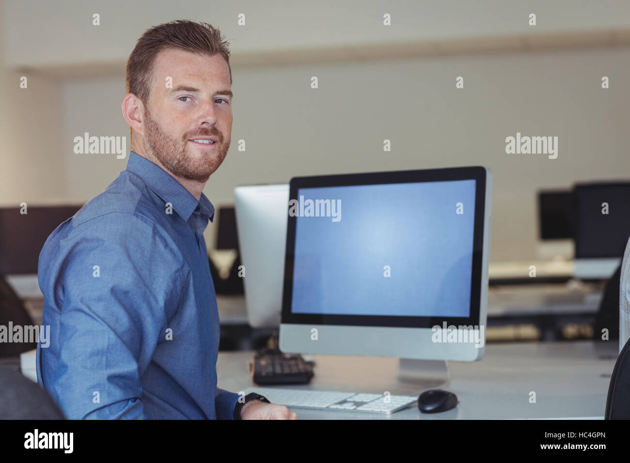 Mature student using computer Stock Photo - Alamy