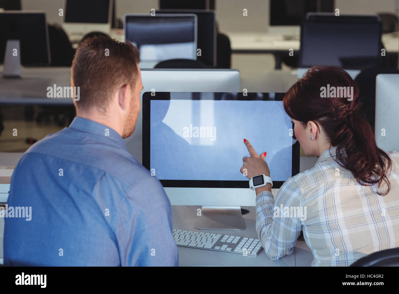 Mature students using computer Stock Photo - Alamy