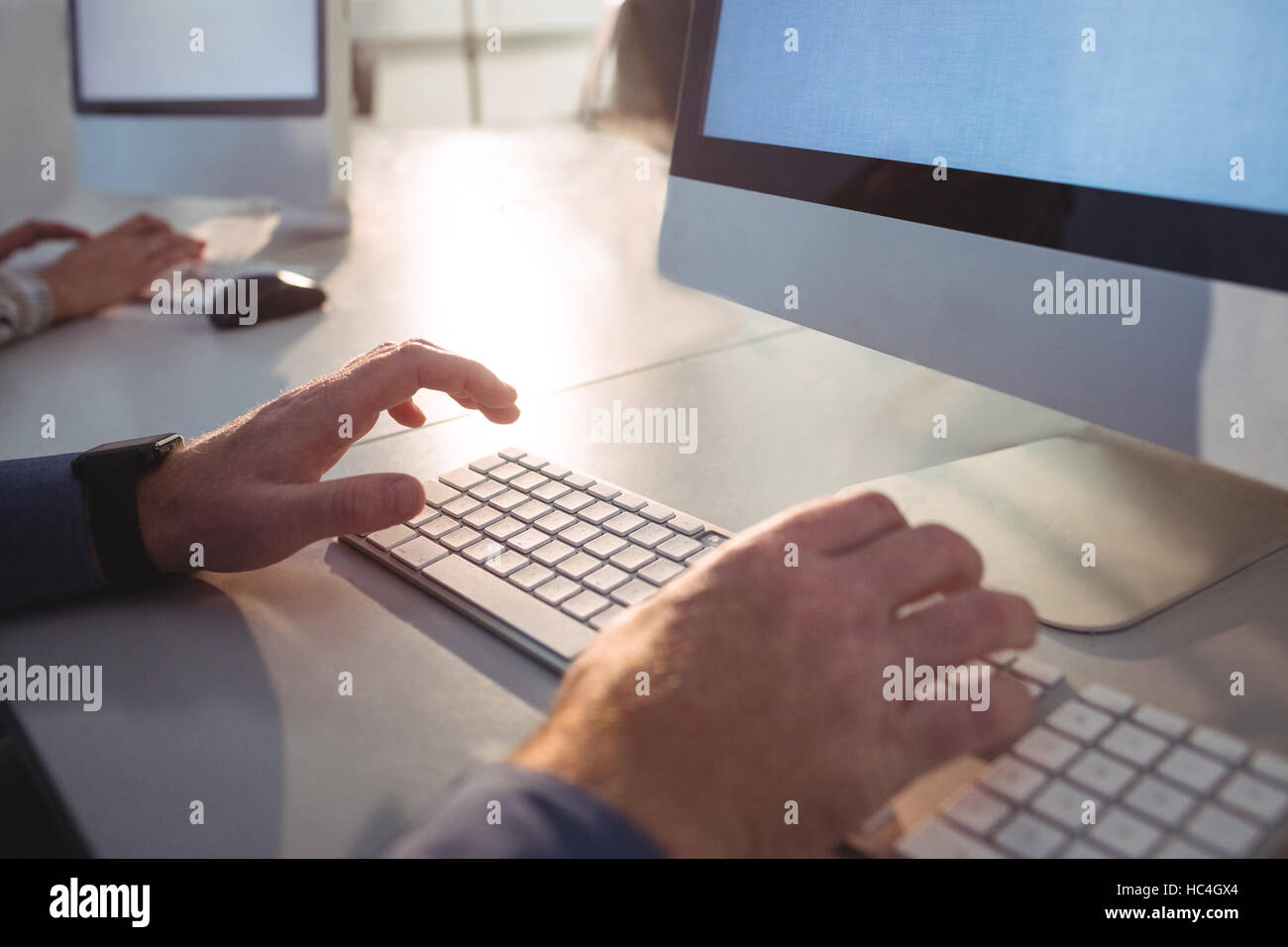 Mature student using computer Stock Photo - Alamy