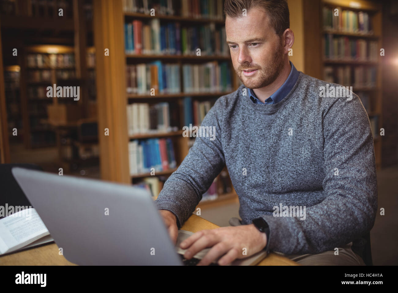 Mature student using laptop Stock Photo - Alamy