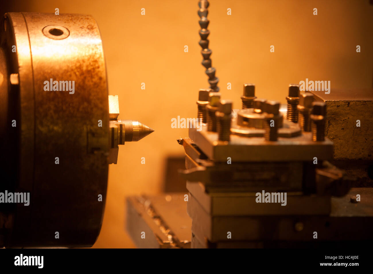 Color image of an old lathe in a workshop Stock Photo - Alamy