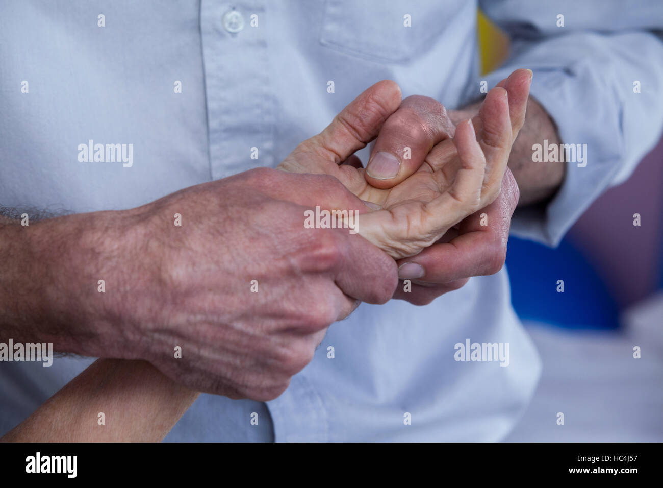 Hand massage elderly hi-res stock photography and images - Alamy