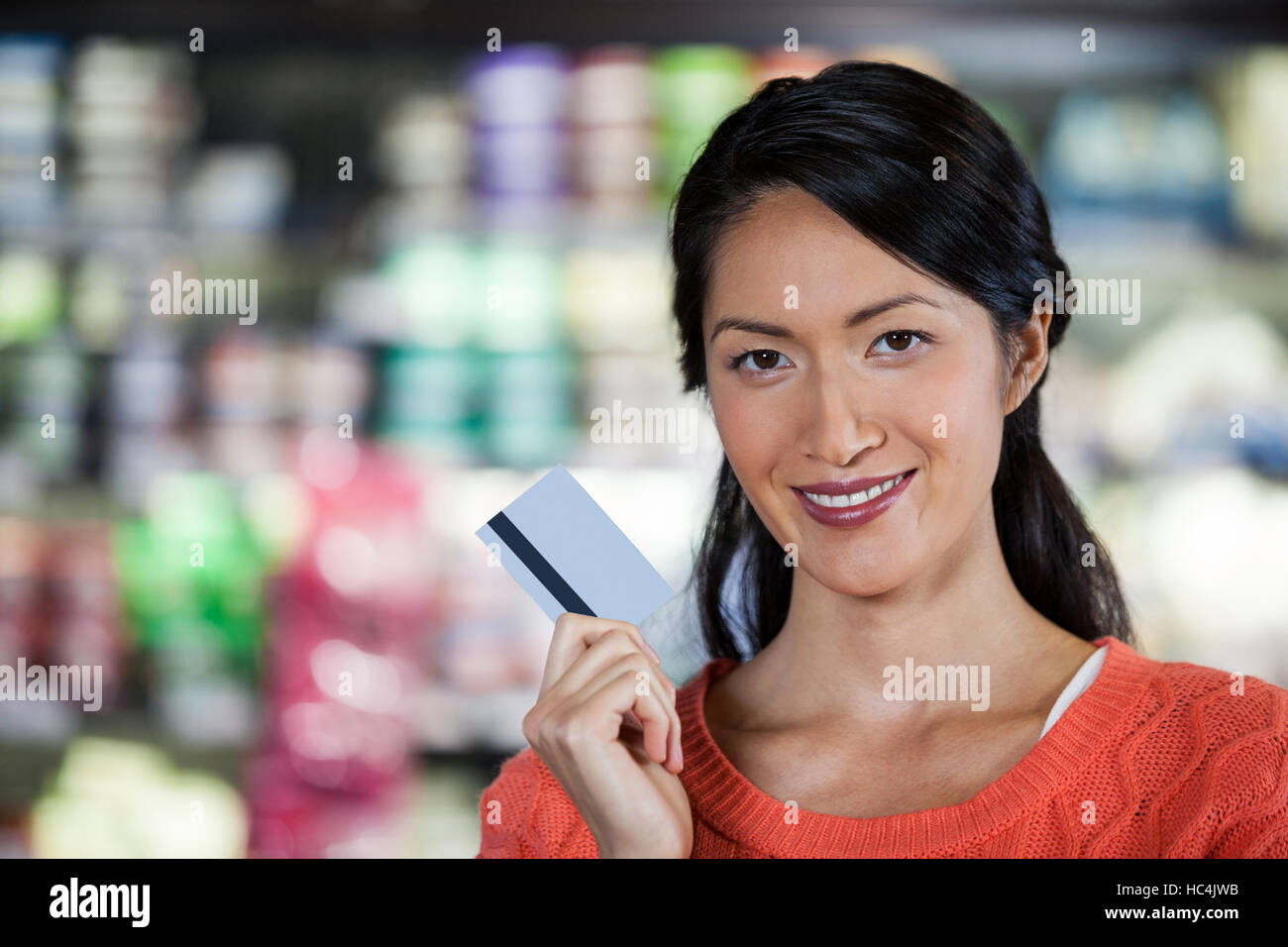 Woman store card hi-res stock photography and images - Alamy