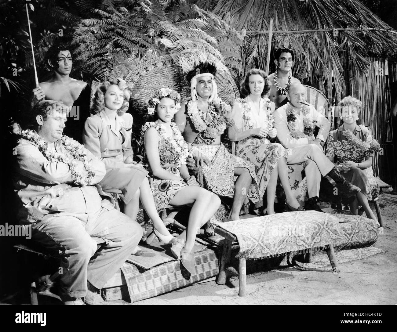 RHYTHM OF THE ISLANDS, seated from left: Andy Devine, Jane Frazee, Acquanetta, Nestor Paiva ...