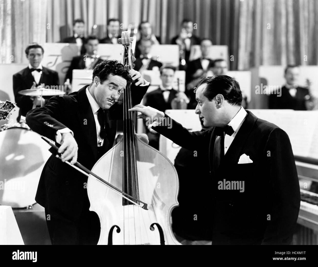 RHYTHM PARADE, from left, Candy Candido, Ted Fio Rito, 1942 Stock Photo ...