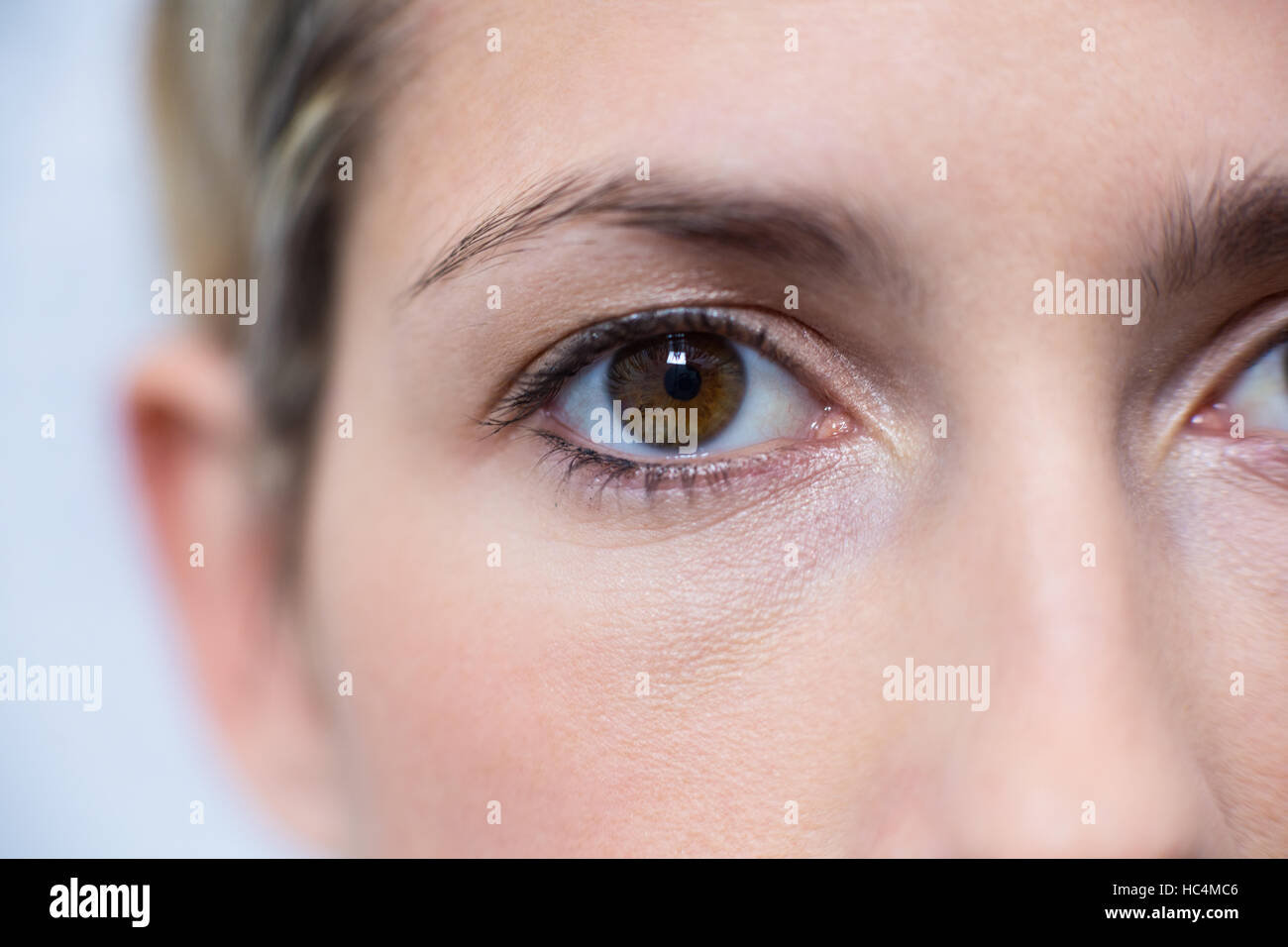 Close up young patient eye hi-res stock photography and images - Alamy