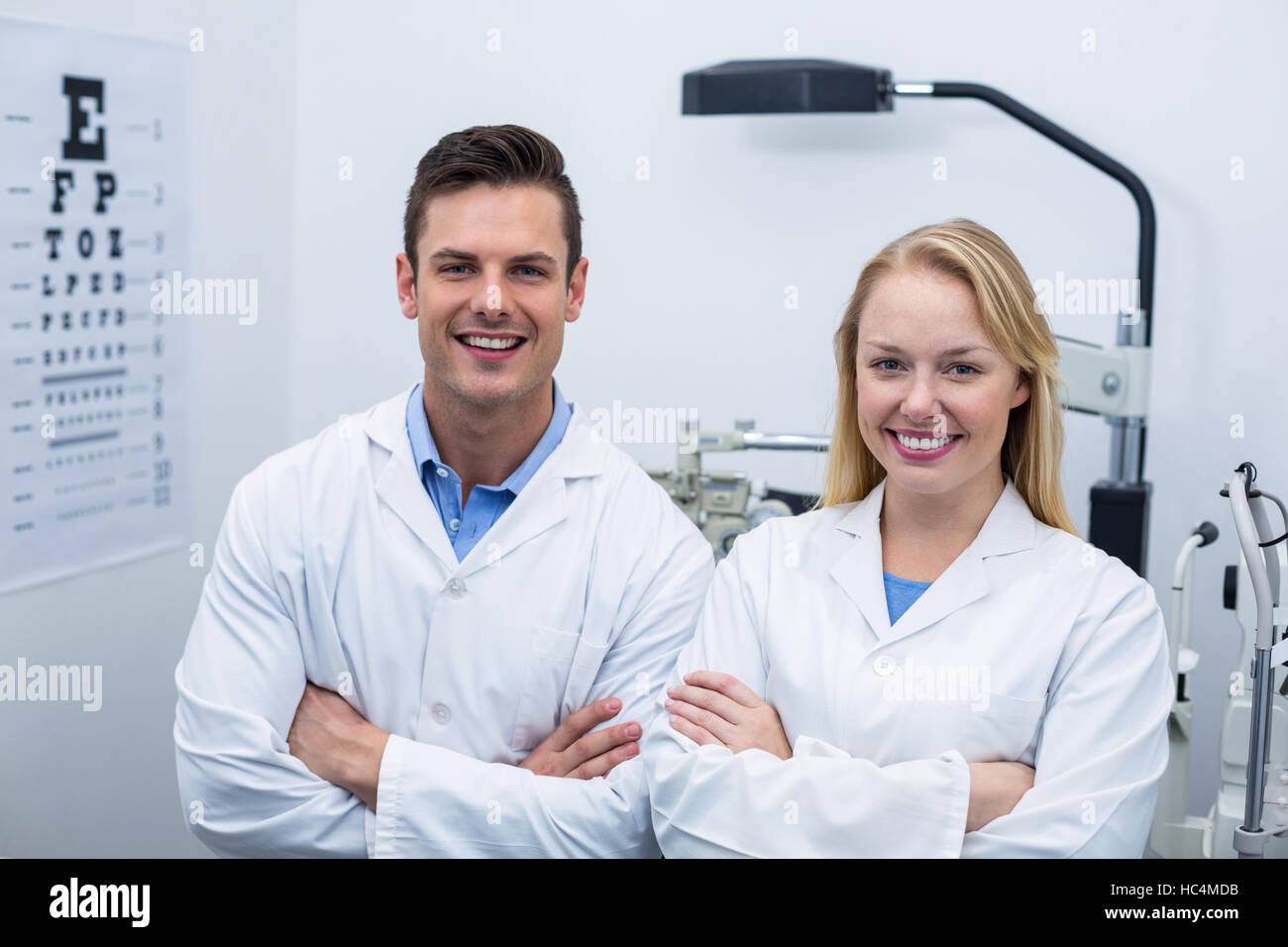 Optometrists standing in ophthalmology clinic Stock Photo - Alamy