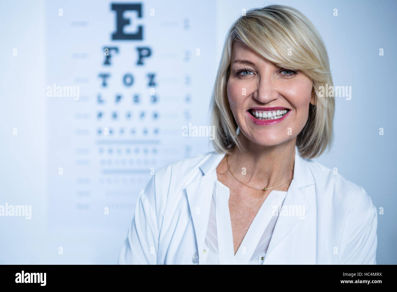 Portrait of smiling female optometrist Stock Photo - Alamy