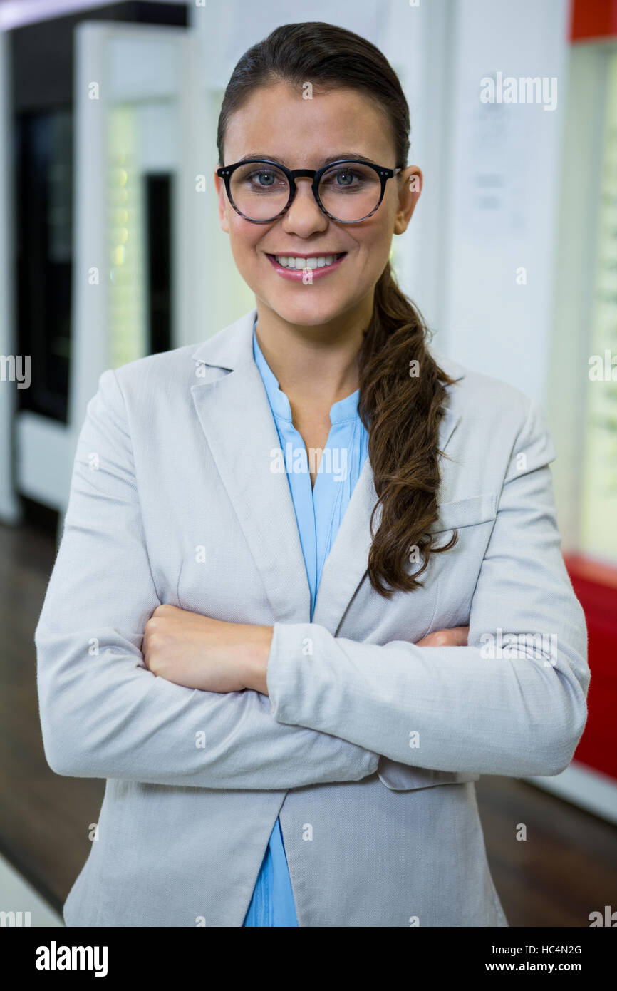 Pretty optometrist smiling camera hi-res stock photography and images ...