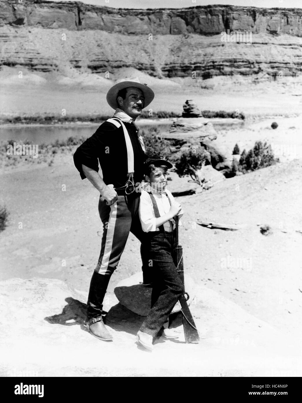 RIO GRANDE, John Wayne, left, with son Patrick Wayne, on location in ...