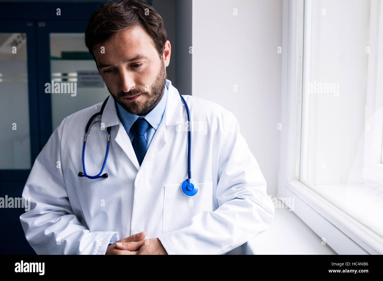 Sad doctor hi-res stock photography and images - Alamy