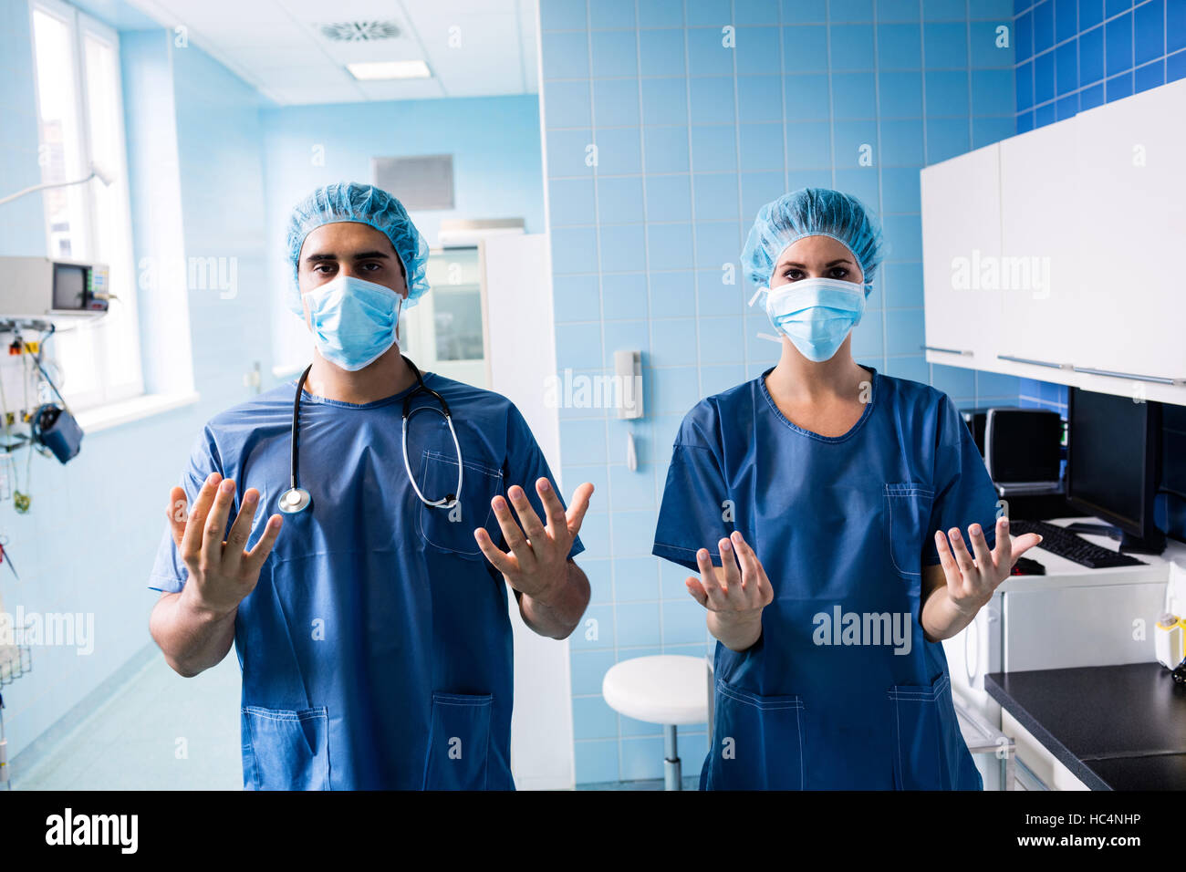 Two surgeons standing in a hospital Stock Photo - Alamy