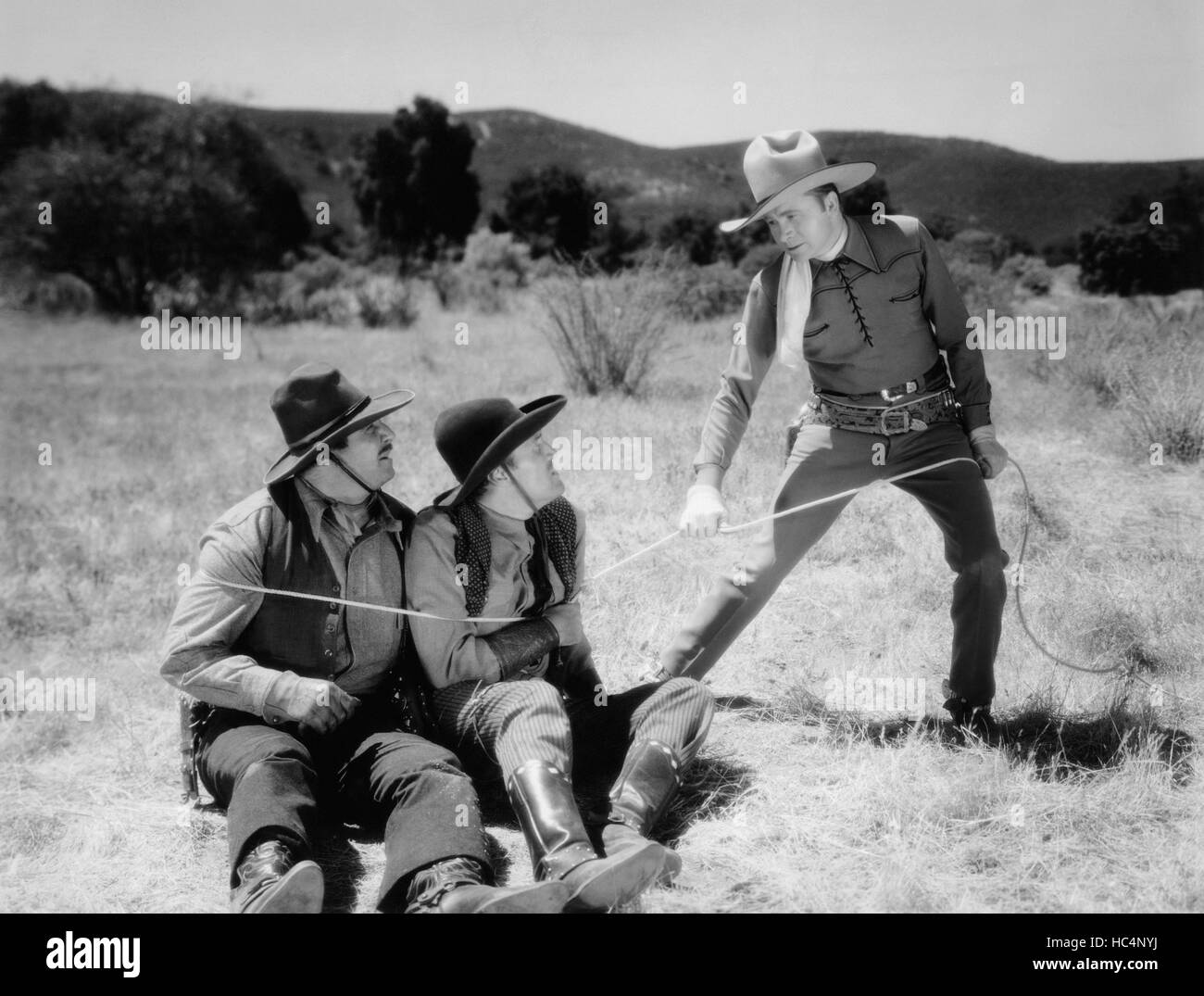 RIDERS OF THE FRONTIER, third from left: Tex Ritter, 1939 Stock Photo ...