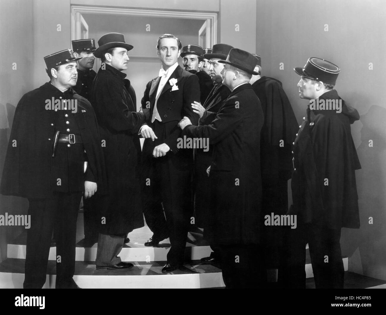 RIO, Gino Corrado (left), Basil Rathbone (in custody), 1939 Stock Photo ...