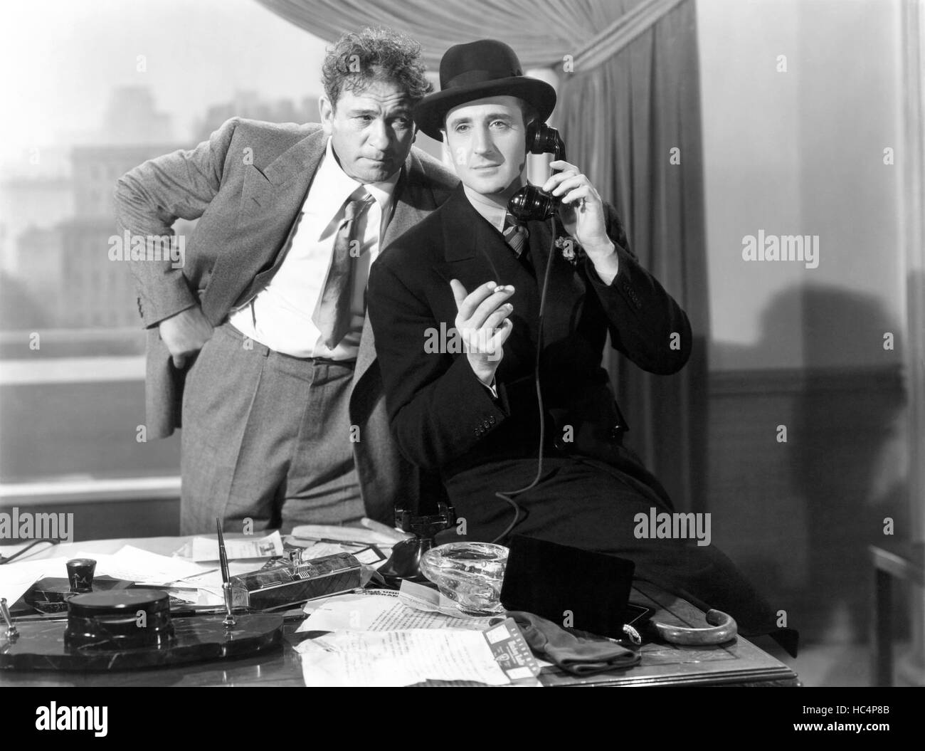 RIO, from left: Victor McLaglen, Basil Rathbone, 1939 Stock Photo - Alamy