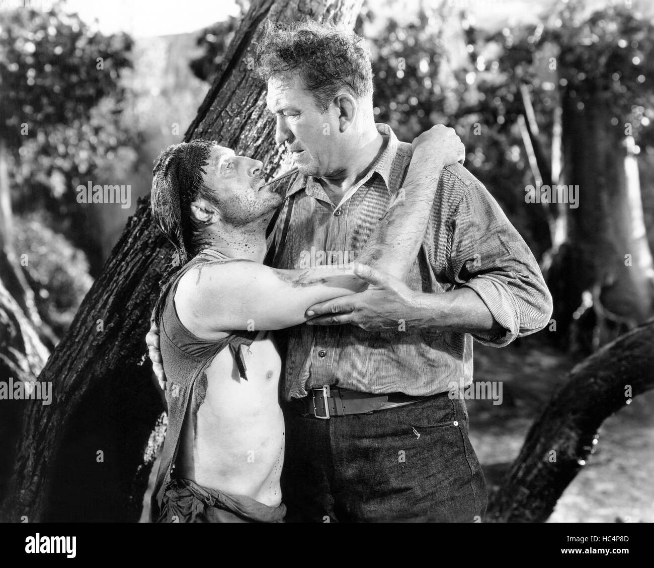 RIO, from left: Basil Rathbone, Victor McLaglen, 1939 Stock Photo - Alamy