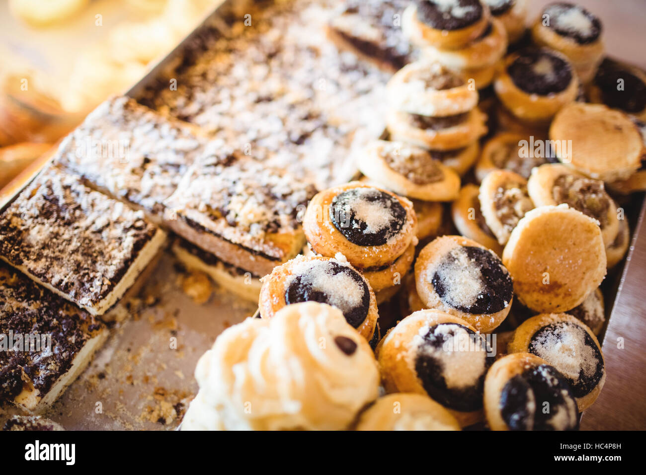 Close-up of various sweet foods on a display Stock Photo - Alamy