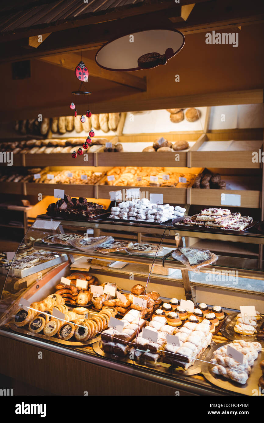 Various sweet foods in bakery shop Stock Photo - Alamy