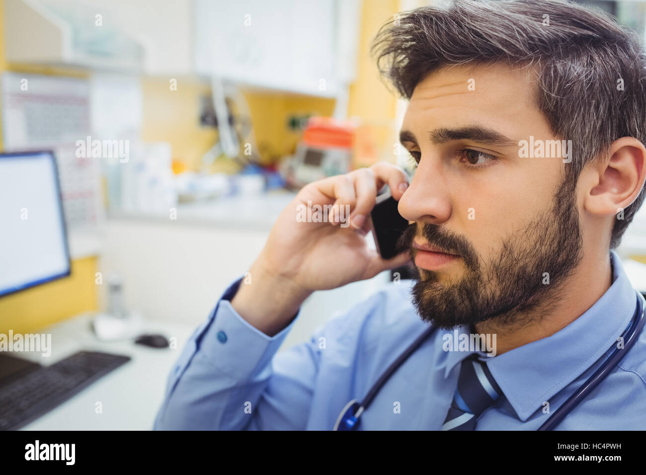 Surgeon talking on his mobile phone hi-res stock photography and images ...