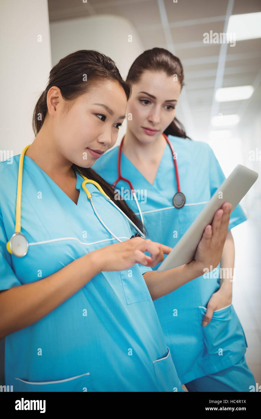 Nurses using digital tablet Stock Photo - Alamy