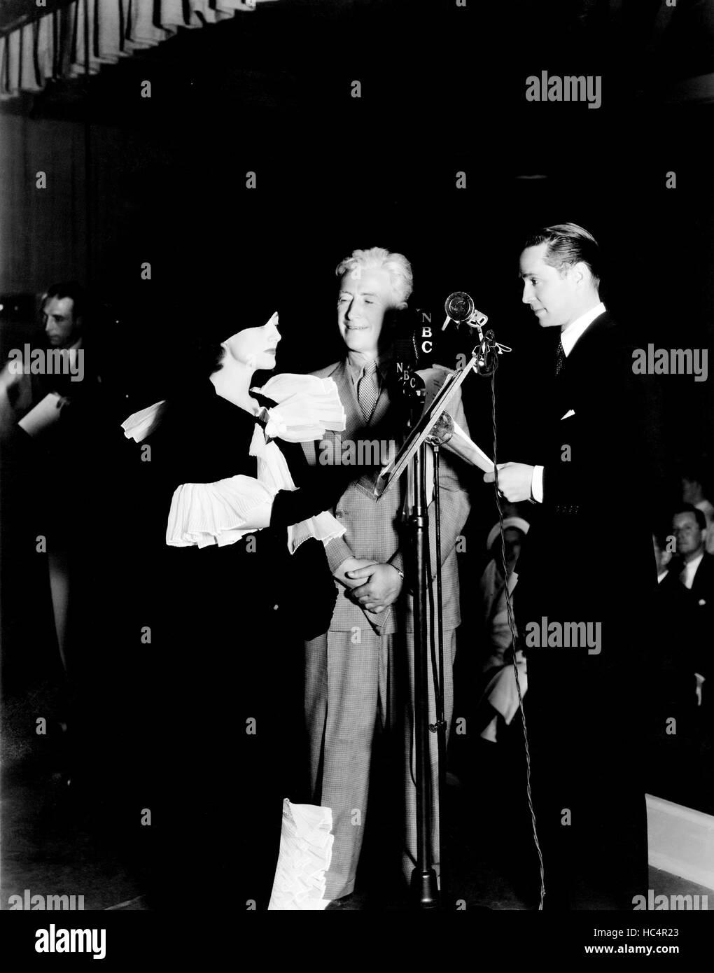 SADIE MCKEE, screenwriter John Meehan (center) looks on as Joan ...