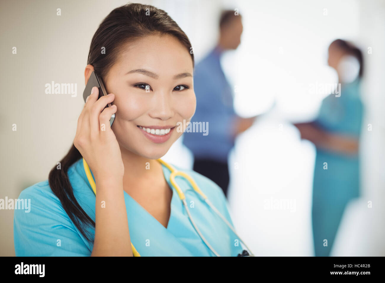 Cheerful nurse talking on hi-res stock photography and images - Alamy