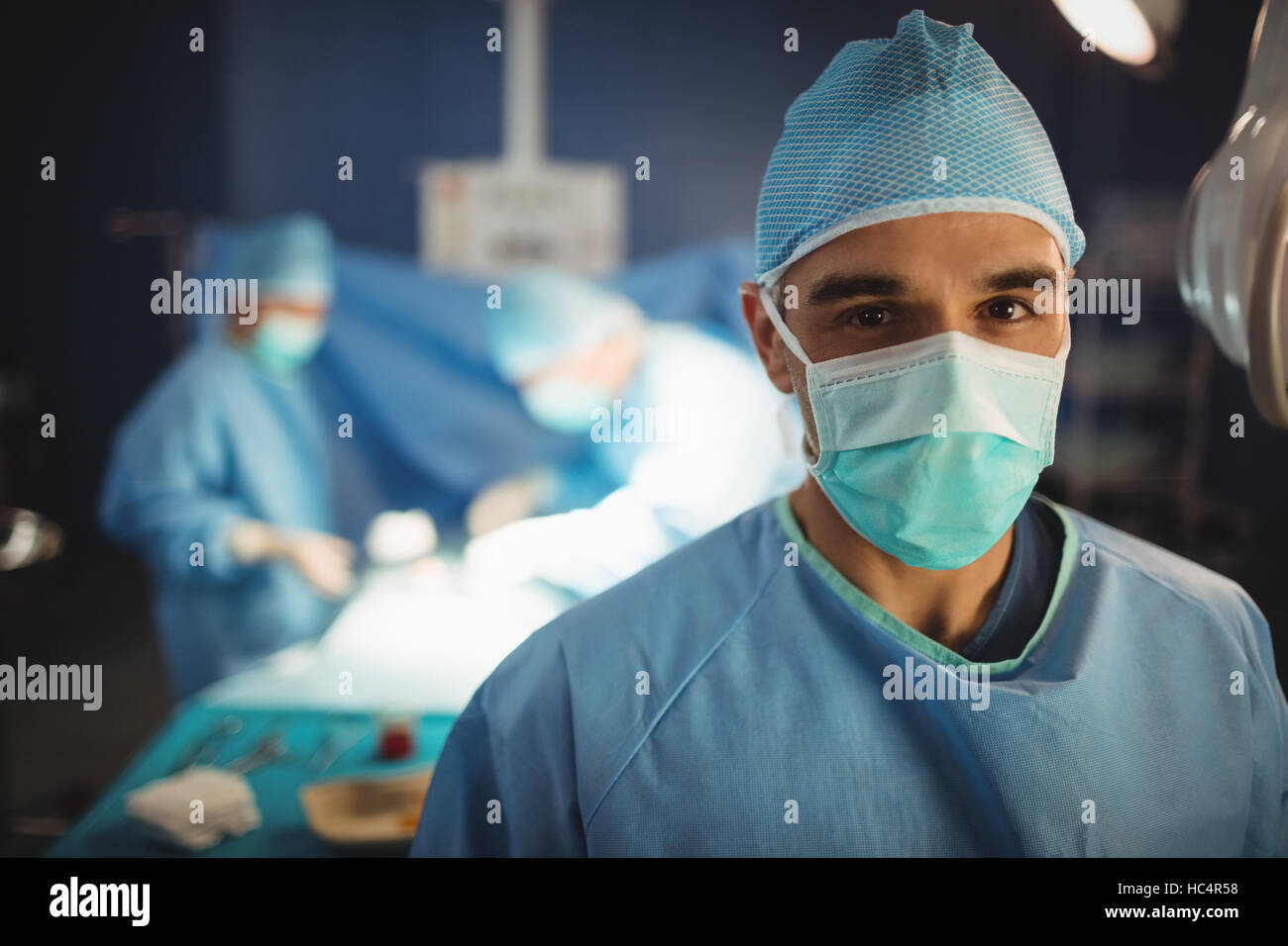 Portrait of a surgeon in operation room Stock Photo - Alamy