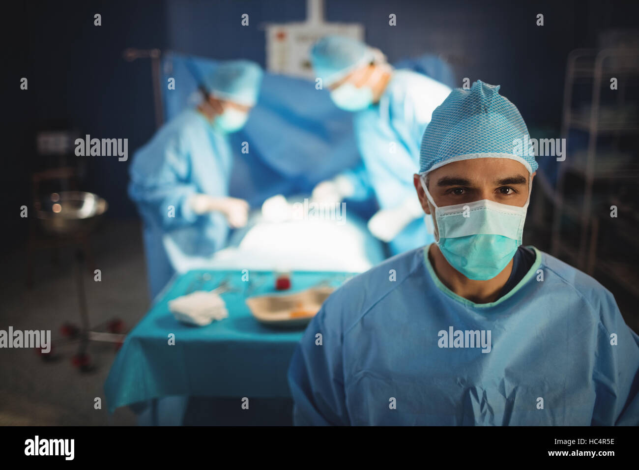Portrait of a surgeon in operation room Stock Photo - Alamy